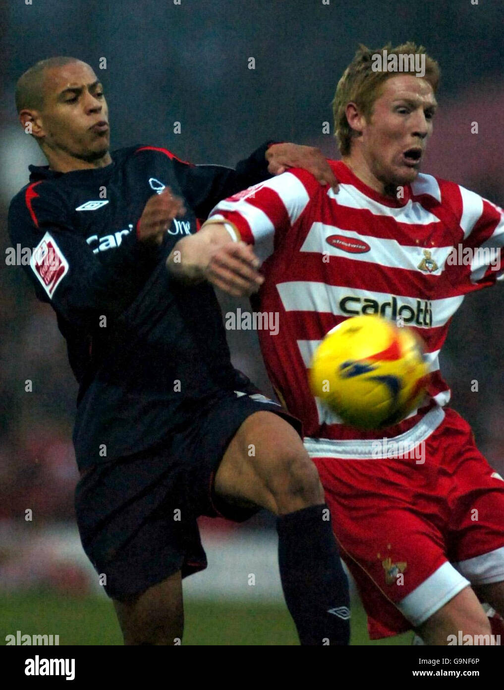 Nottingham Forest's Nathan Tyson and Doncaster Rover's Adam Lockwood ...