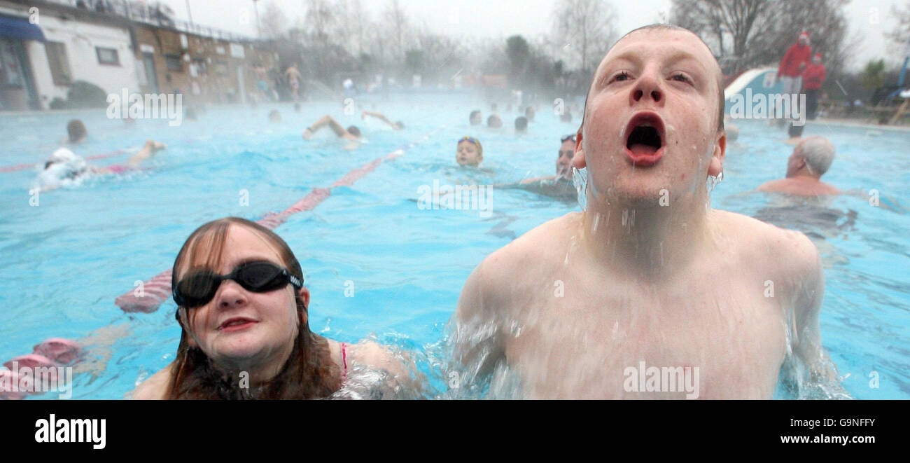 photo of swimmers enjoy an early morning swim in the Hampton open air ...