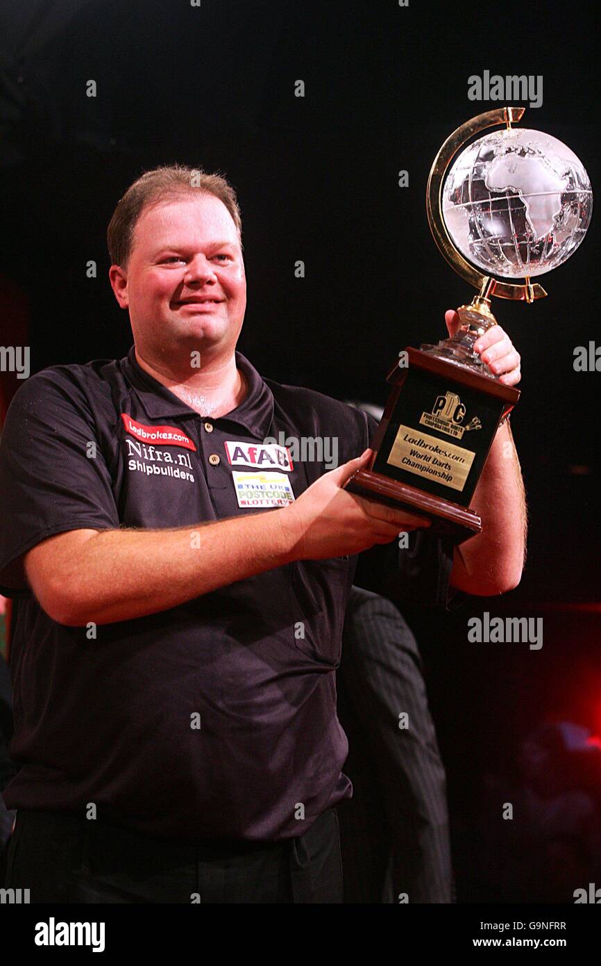 Phil taylor celebrates with the trophy hi-res stock photography and ...