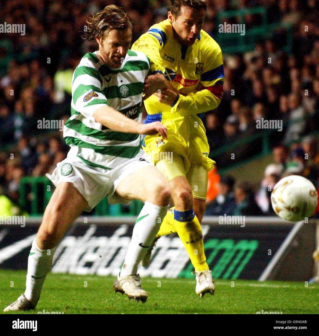 Celtic new signing Steven Pressley (left) in action against Garry Hay ...