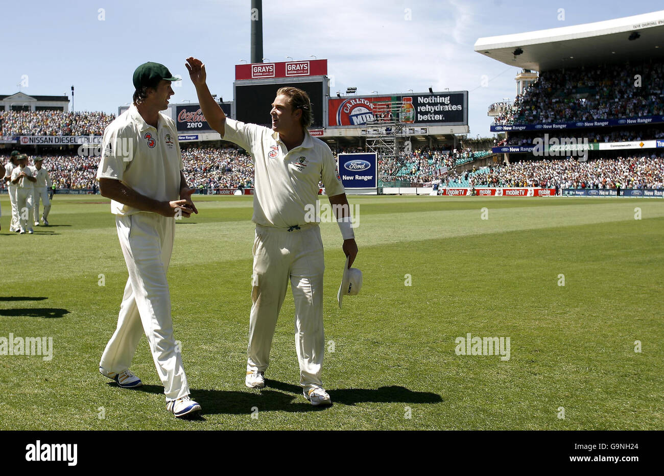 Australia's Glenn McGrath and Shane Warne leave the field after England ...