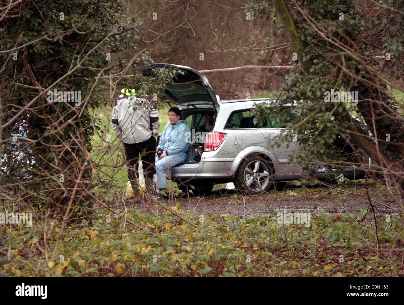 Police forensic officers gather evidence at the scene in Wanstead Park ...