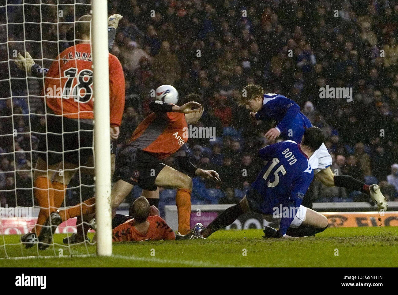 Chris Burke of Rangers scores a header during the Bank of Scotland ...