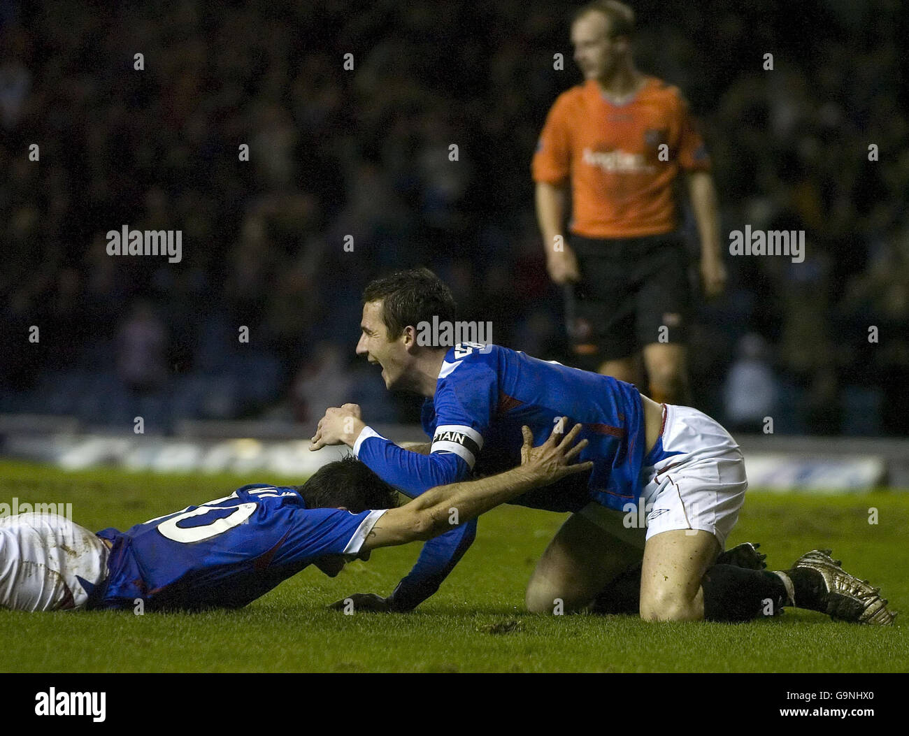 Rangers Barry Ferguson (right) marks his comeback as captain by scoring ...