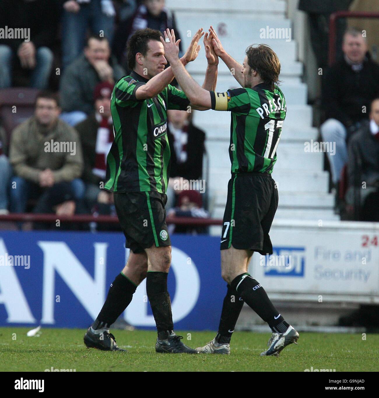 Jan Vennegoor of Hesselink , Celtic celebrates with Stephen Pressley ...