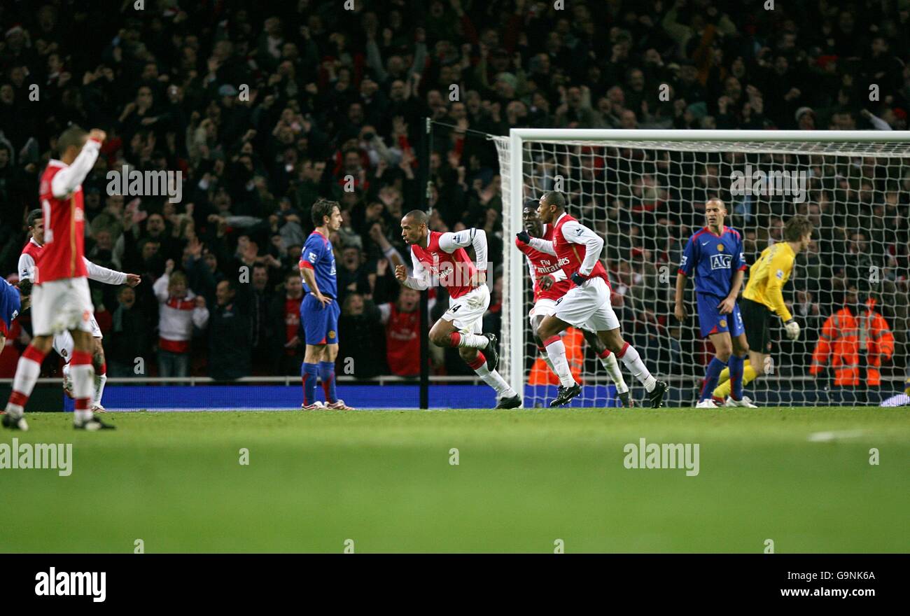Arsenal's Thierry Henry heads in the winning goal of the match and runs ...