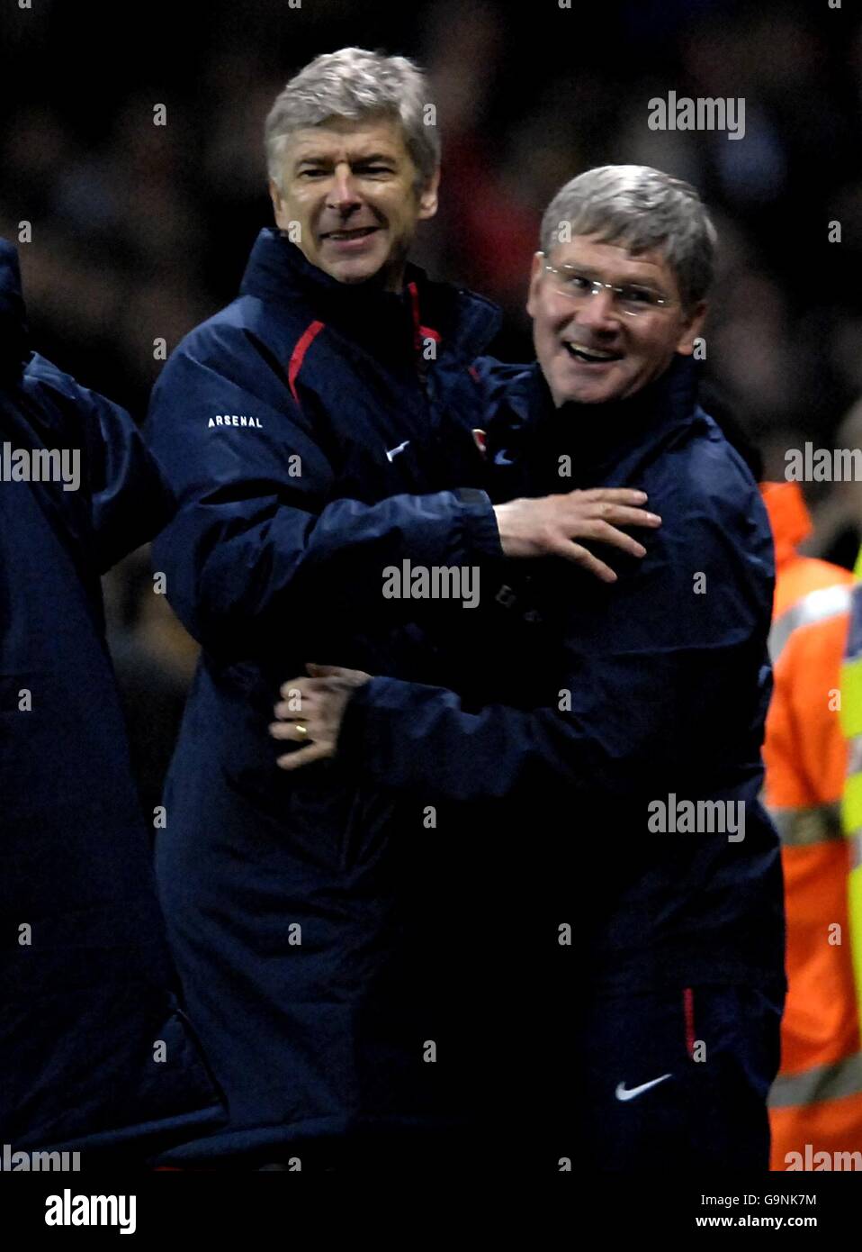 (L-R) Arsenal manager Arsene Wenger celebrates with assistant Pat Rice ...