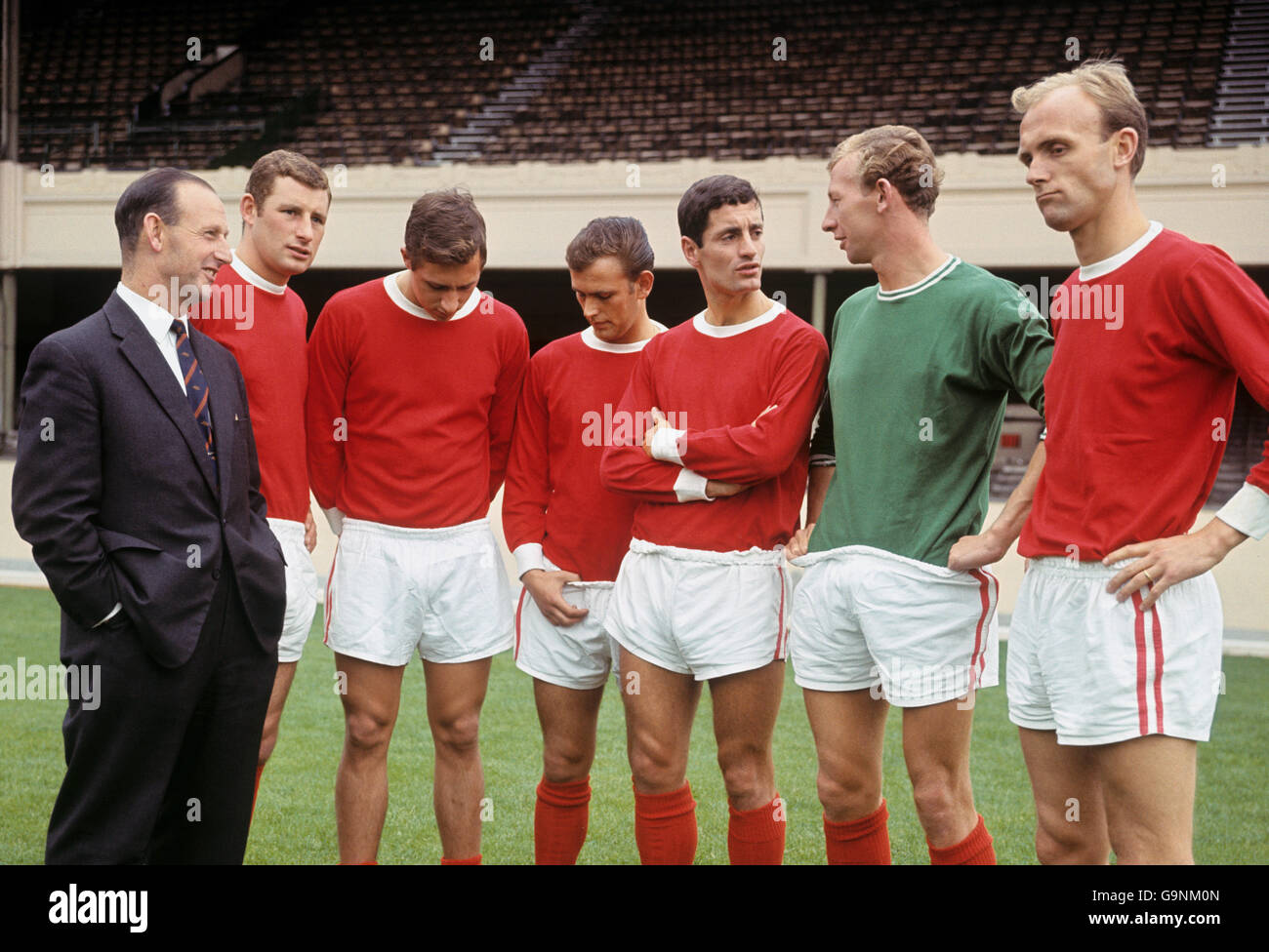 Acting Arsenal manager Bertie Mee talks with players at Highbury ...