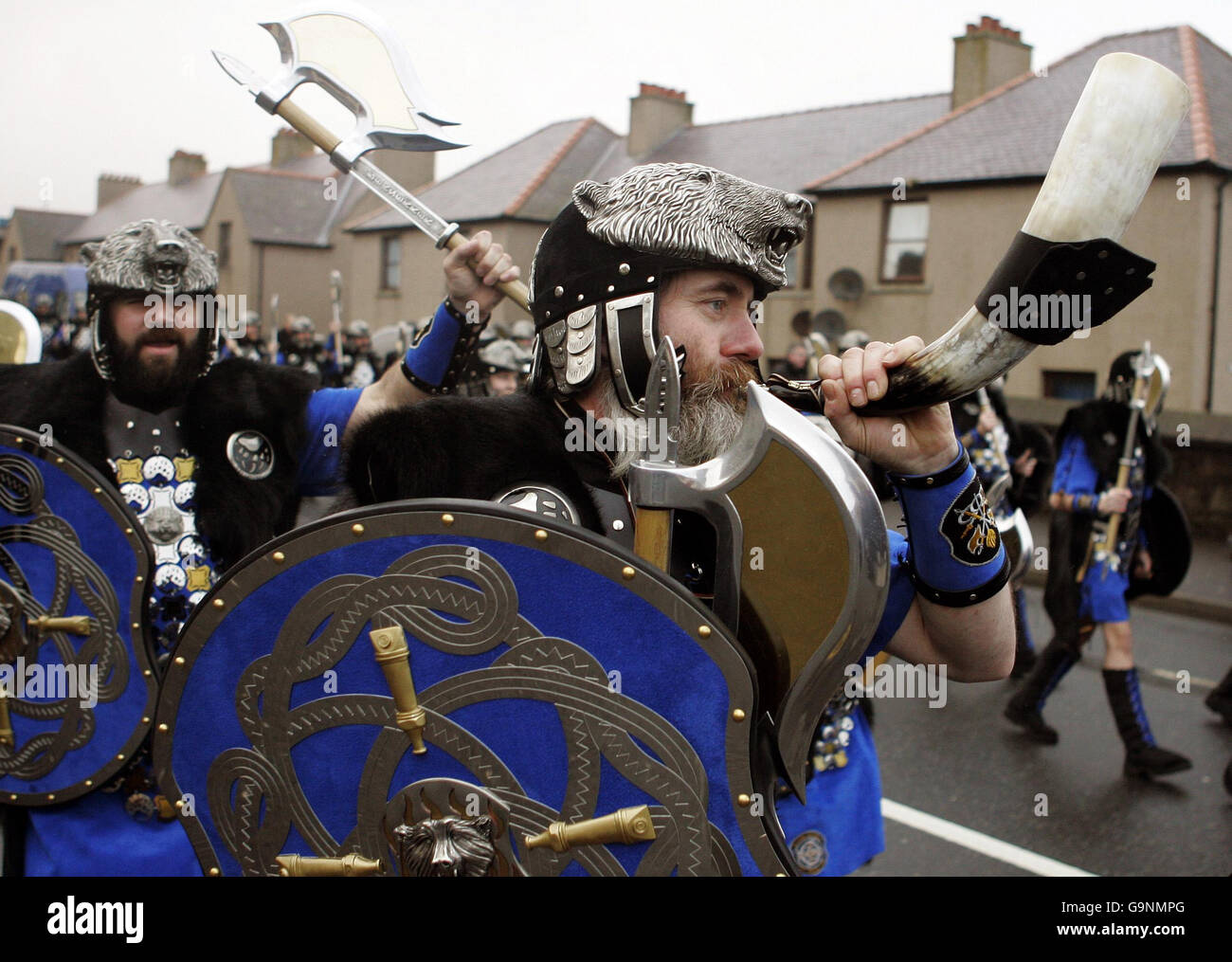 Shetland fire festival. The Jarl Squad march through the streets of ...