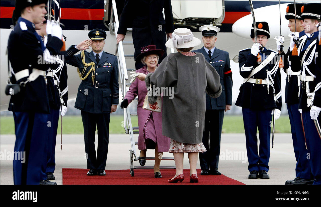 Britain's Queen Elizabeth II (left) is greeted by Queen Beatrix of the ...