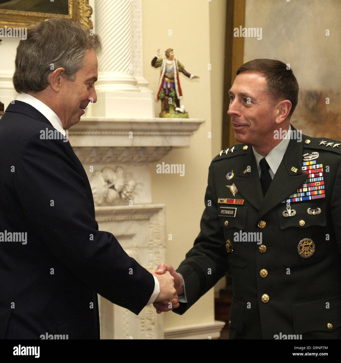 Britain's Prime Minister Tony Blair, left, greets the Allied Forces ...
