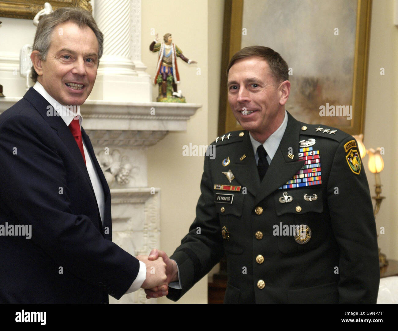 Britain's Prime Minister Tony Blair, left, greets the Allied Forces ...