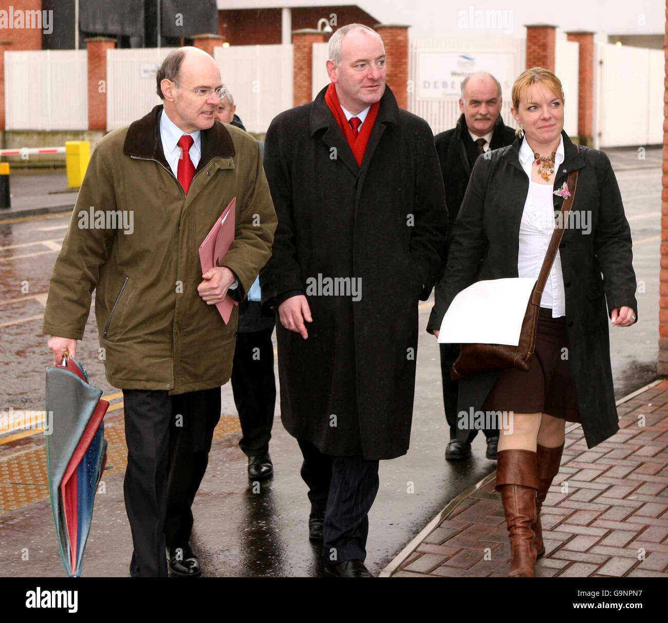 SDLP leader Mark Durkan (centre) with North Antrim candidates Declan O ...