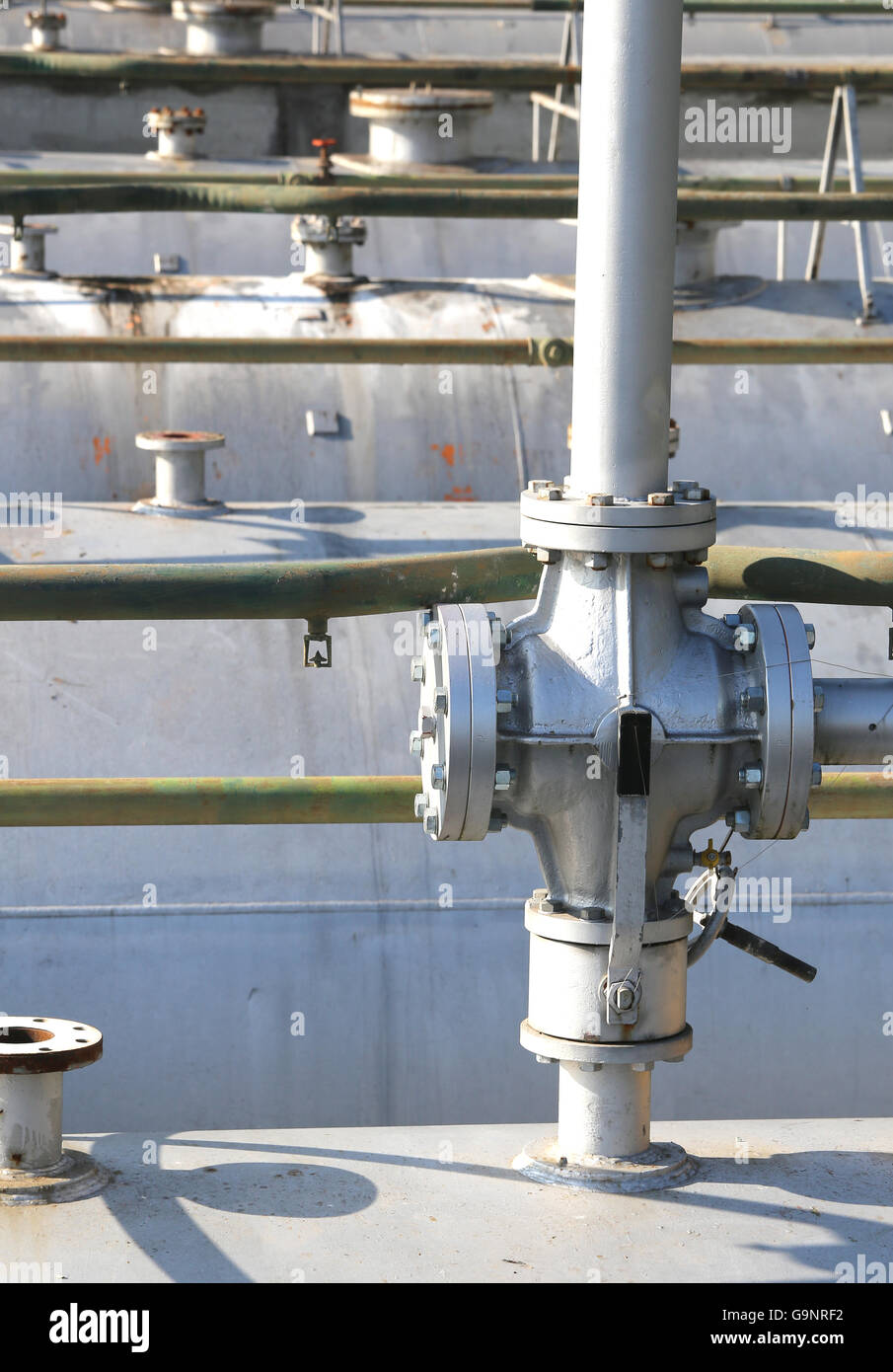 big ball valve above the huge gas cylinder in the system of natural gas ...
