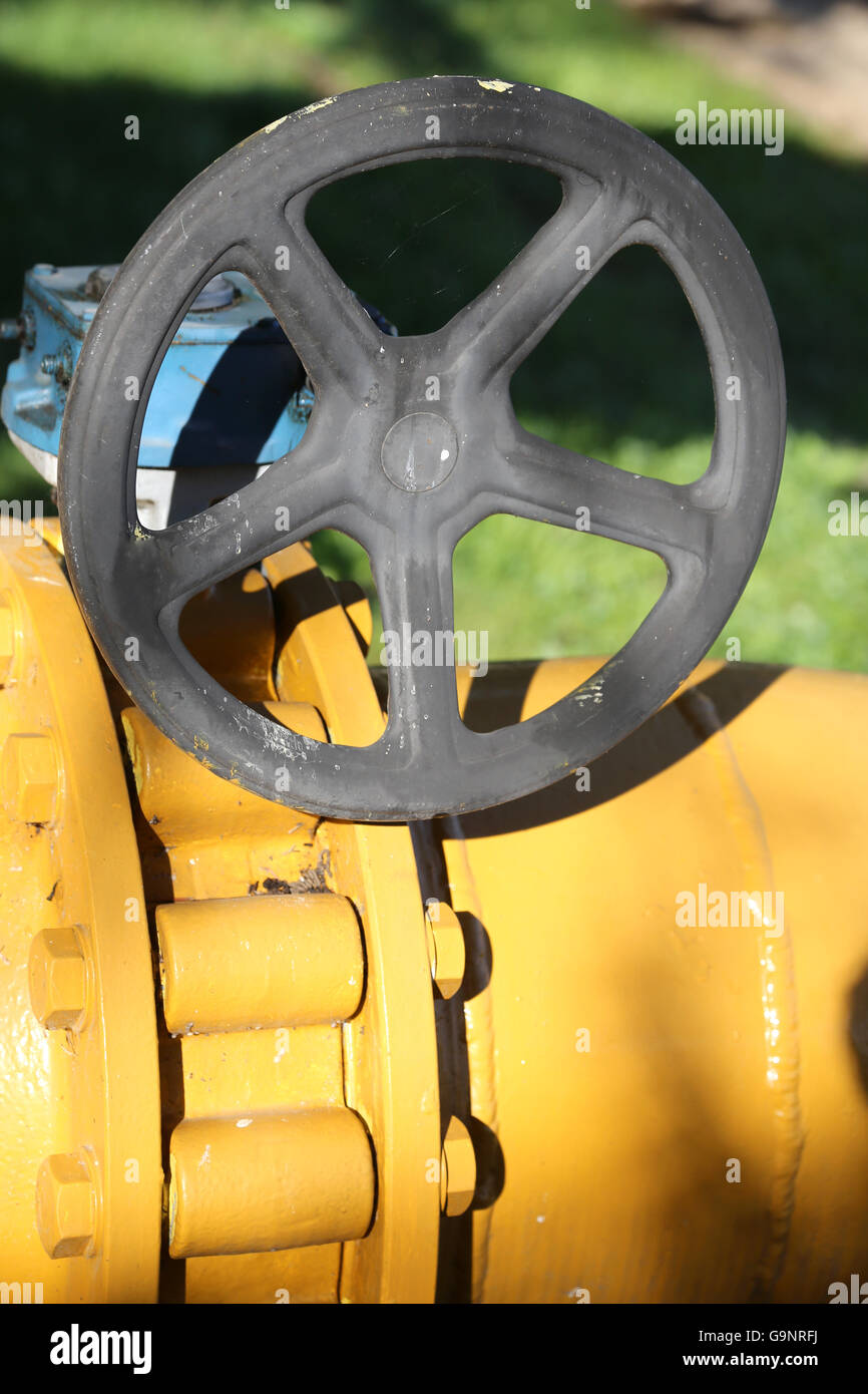 large gas pipeline with well tightened bolts and the shut-off valve for ...