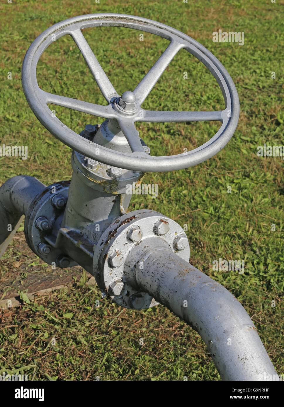 big valve with a sliding part that controls the extent of the aperture ...