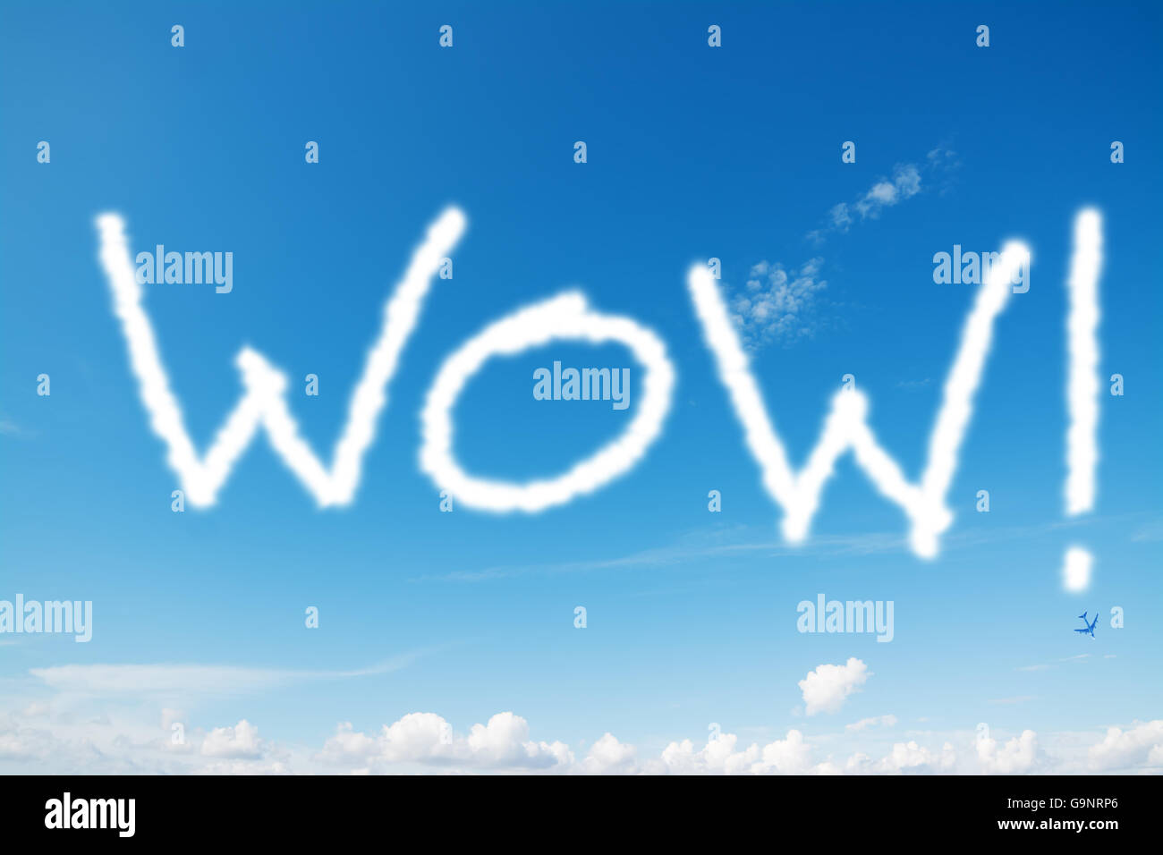 wow written in the blue sky Stock Photo - Alamy