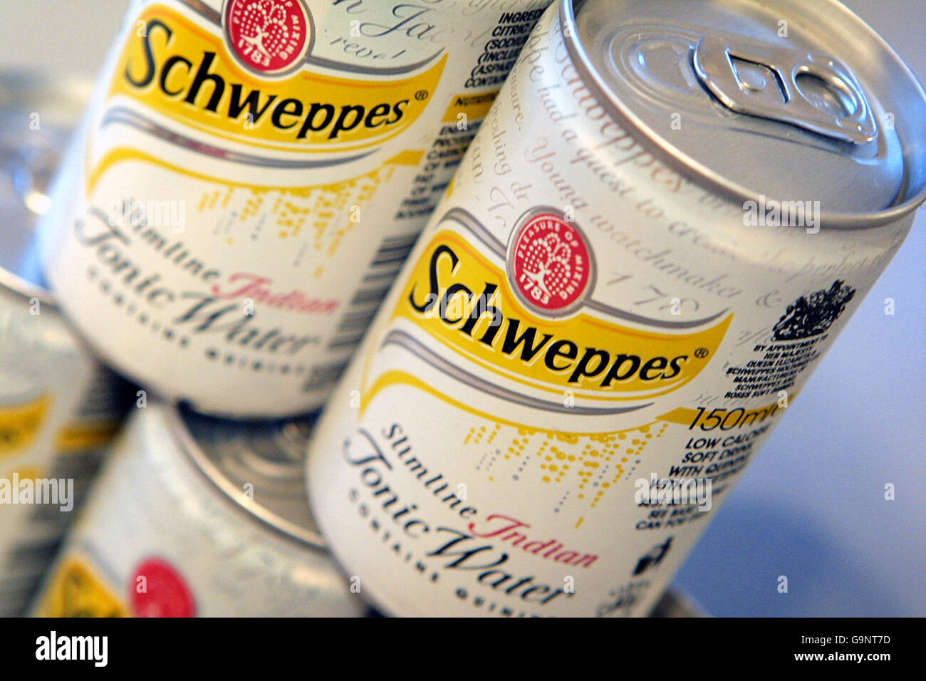 Cans of Schweppes tonic water Stock Photo - Alamy