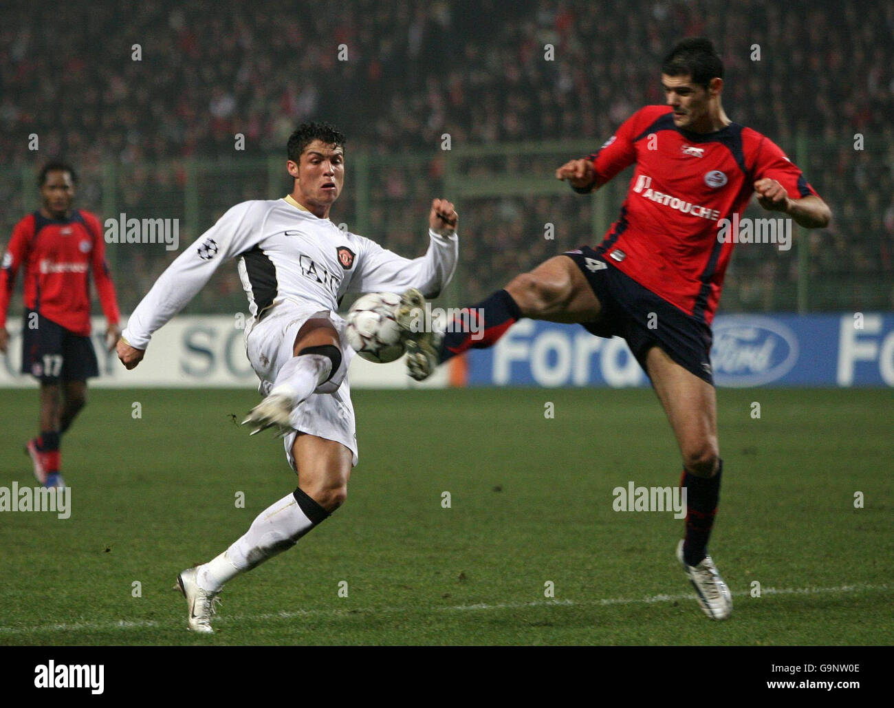 Manchester United's Cristiano Ronaldo (left) battles with Lille's ...
