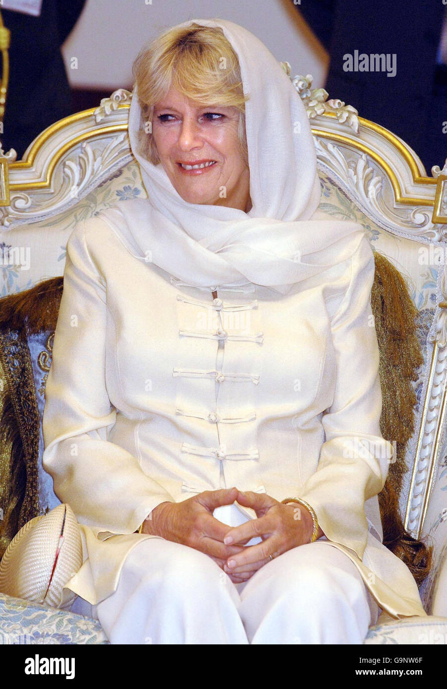 The Duchess of Cornwall takes a rest during a tour of the Grand Mosque ...