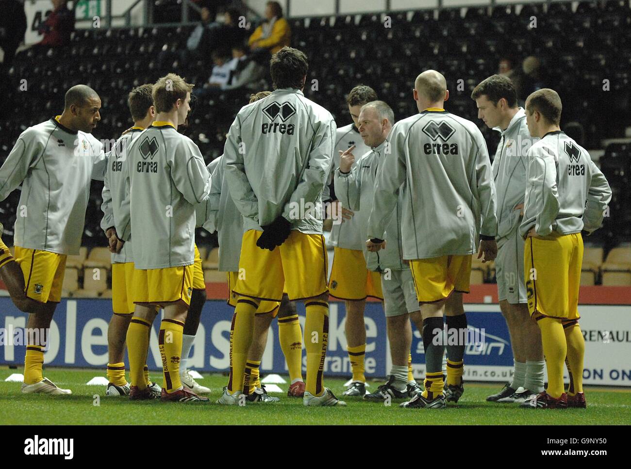 Burnley's assistant manager Dave Kevan talks to the team before the ...