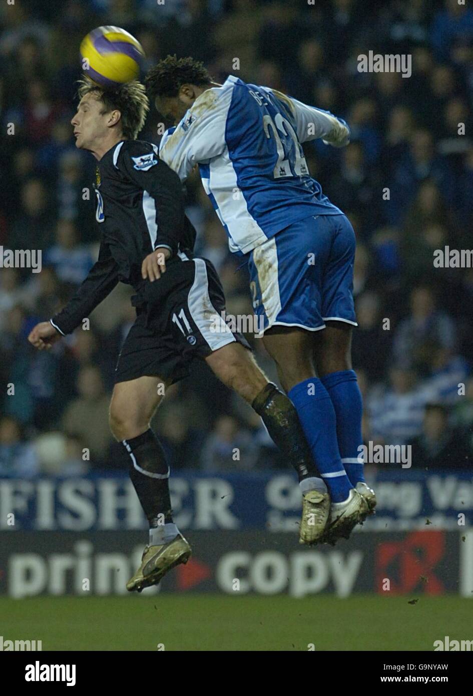 Reading's Andre Bikey (right) challenges Wigan Athletic's Andreas ...
