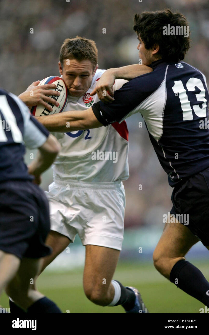 England's Jonny Wilkinson and Scotland's Marcu Di Rollo battle during ...