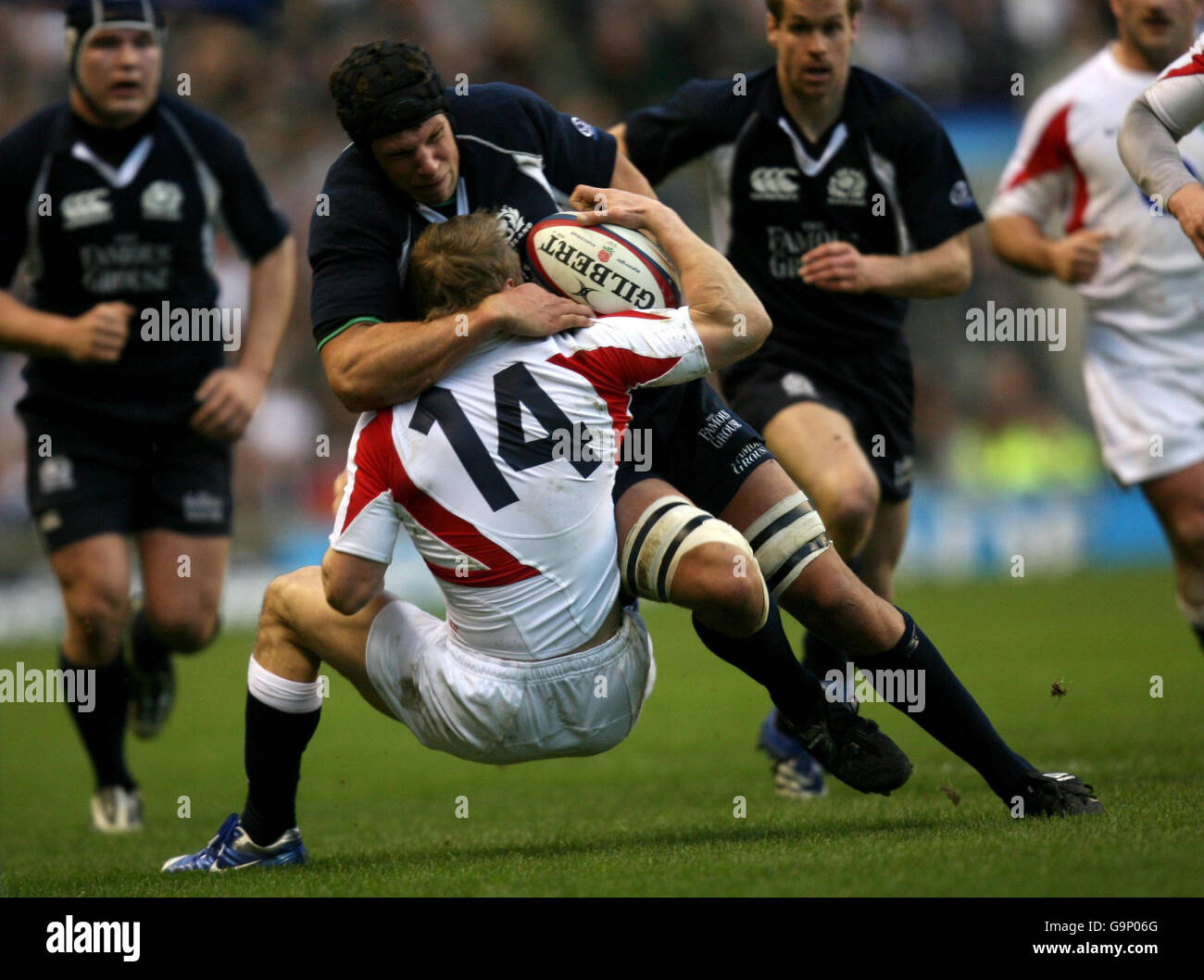 Action ball tackling fighting mangsb hi-res stock photography and ...