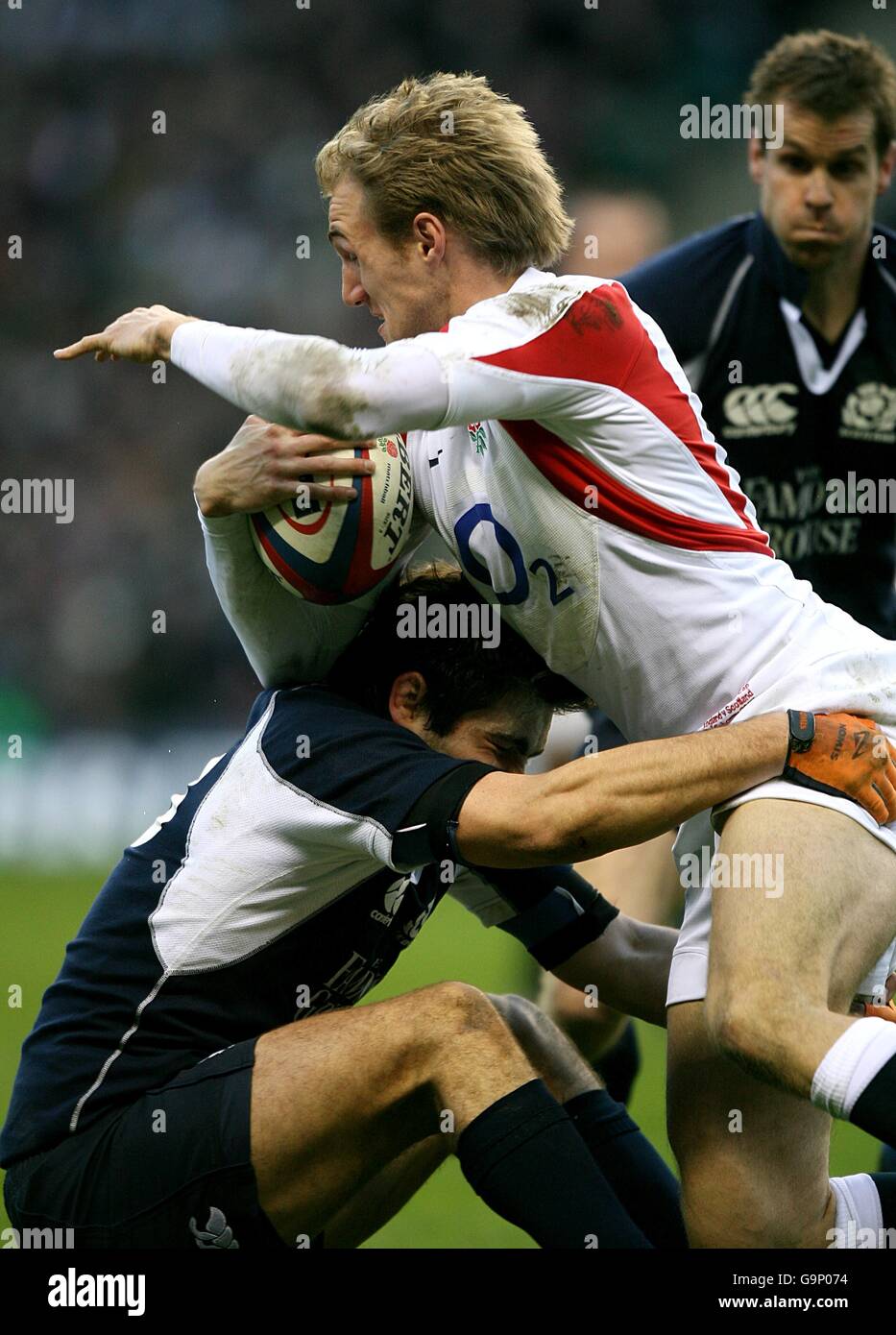 L r scotlands marcus di rollo tackles englands olly morgan hi-res stock ...