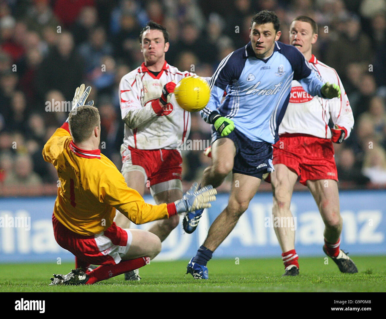 Dublin's Alan Brogan sees his shot saved by Tyrone's goalkeeper Pascal ...