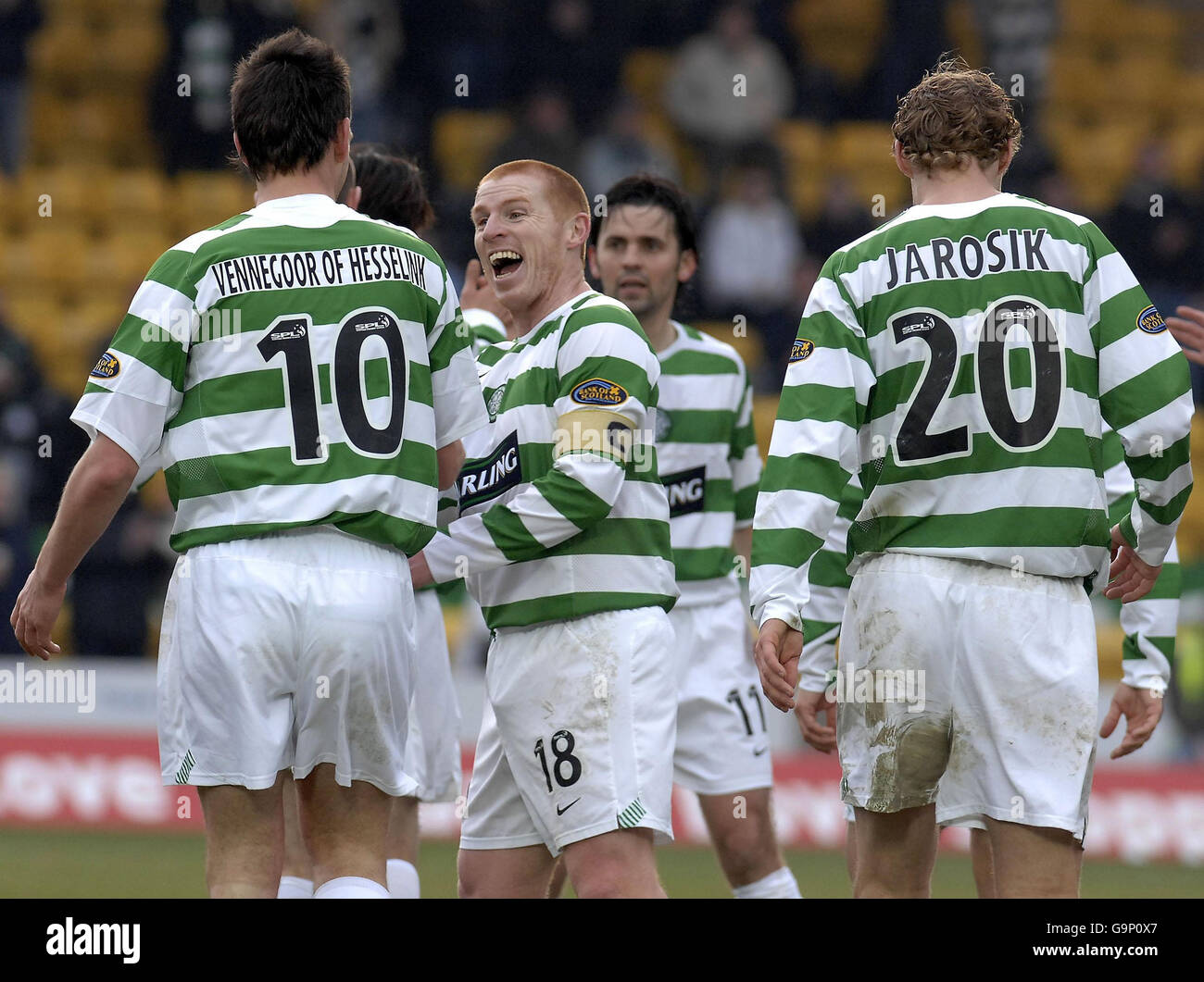 Celtic captain Neil Lennon looks happy with Jan Vennegoor of Hesselink ...