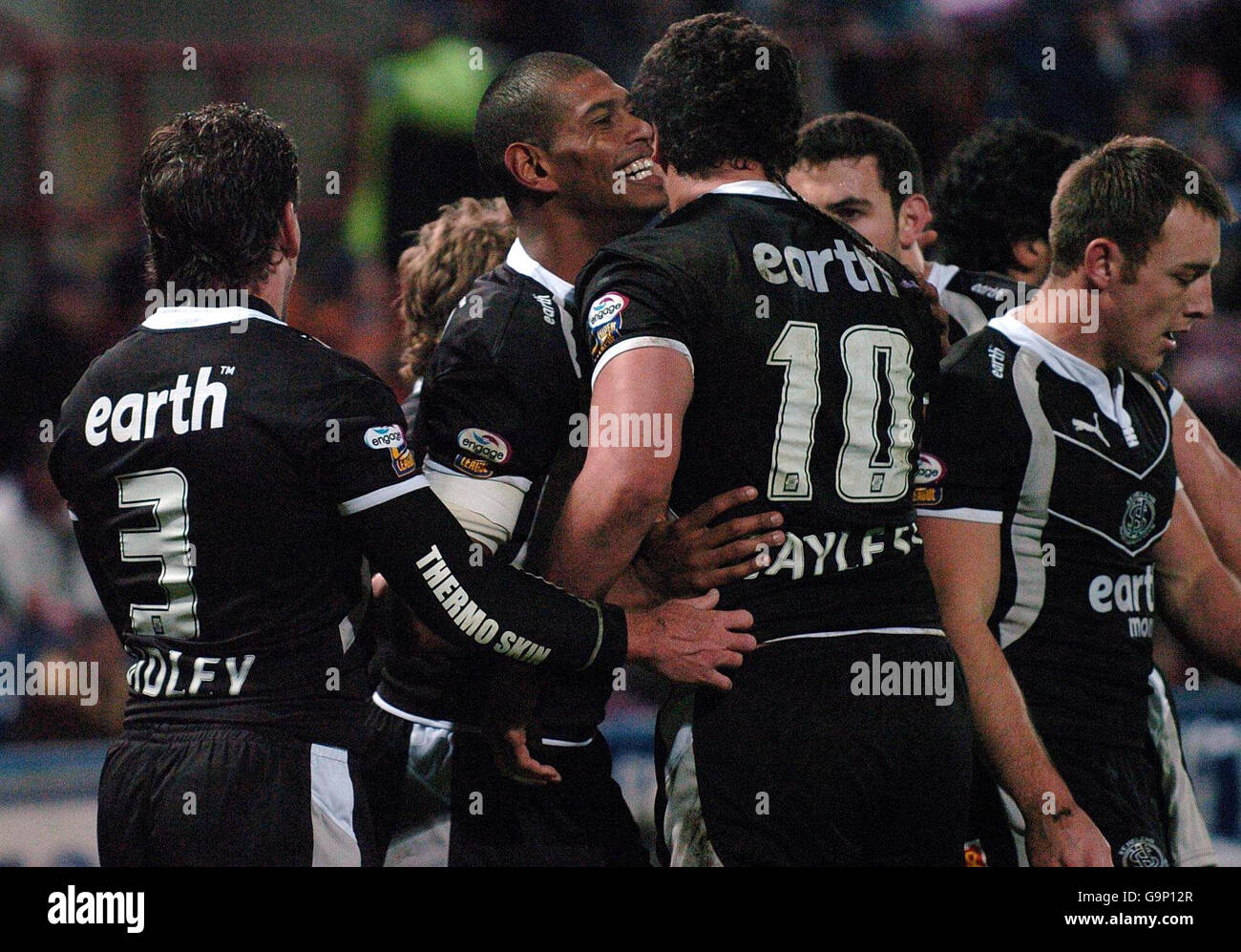 St Helens' Leon Pryce celebrates his try against Huddersfield with ...
