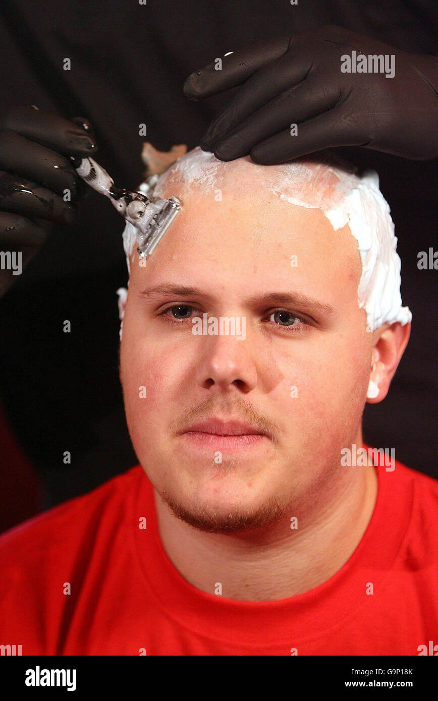 Man has english breakfast tattooed on head hi-res stock photography and ...