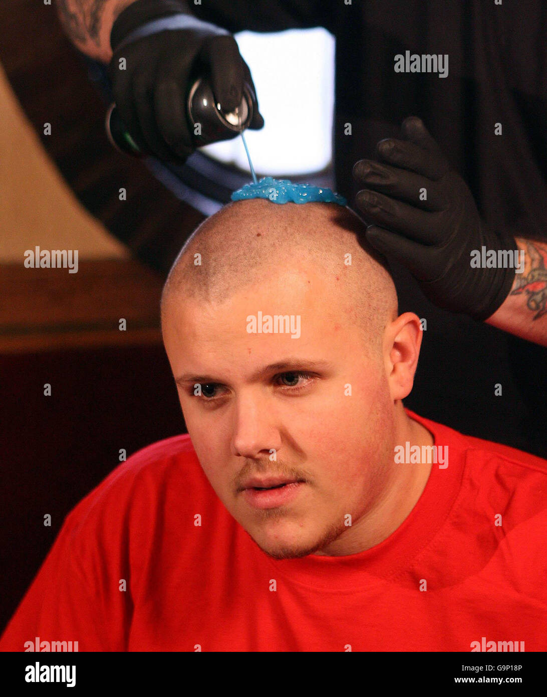 Man has english breakfast tattooed on head Stock Photo - Alamy