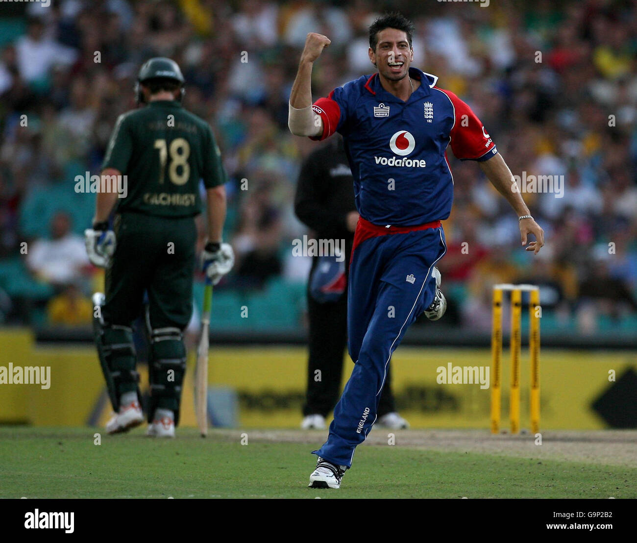 England's Sajid Mahmood (right) celebrates taking the wicket of ...
