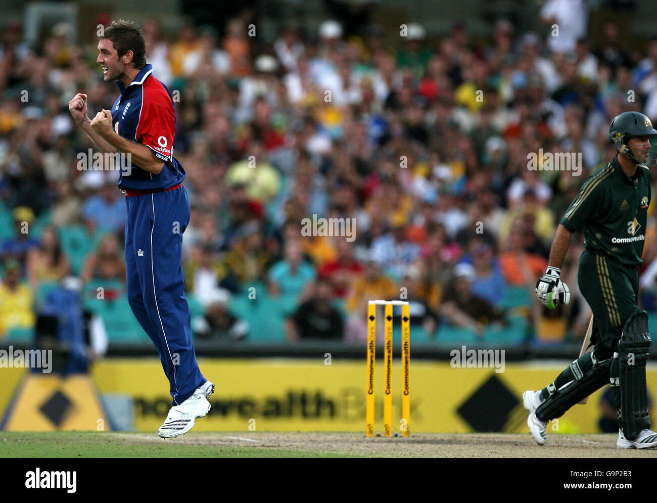 England's Liam Plunkett (left) celebrates dismissing Australia's Ricky ...
