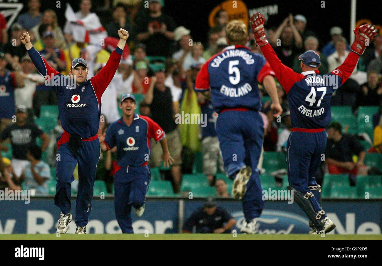 England's Jamie Dalrymple (left) celebrates catching out Australia's ...