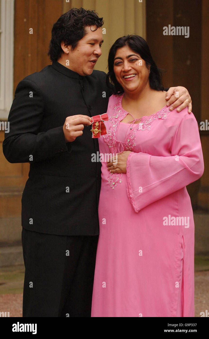 Film director Gurinder Chadha stands with husband Paul Berges, after ...