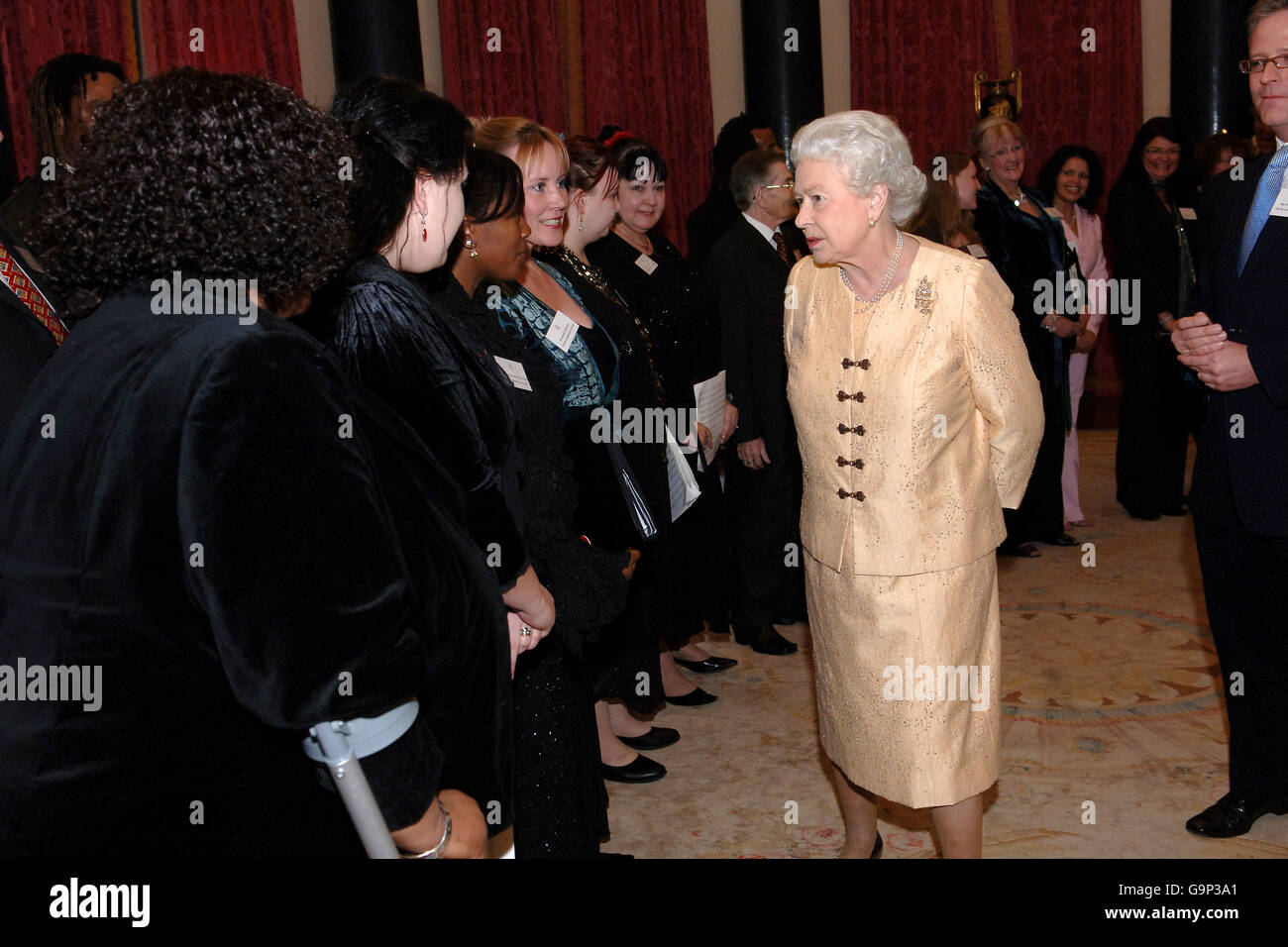 Britain's Queen Elizabeth II meets members of The Singing Estate choir ...