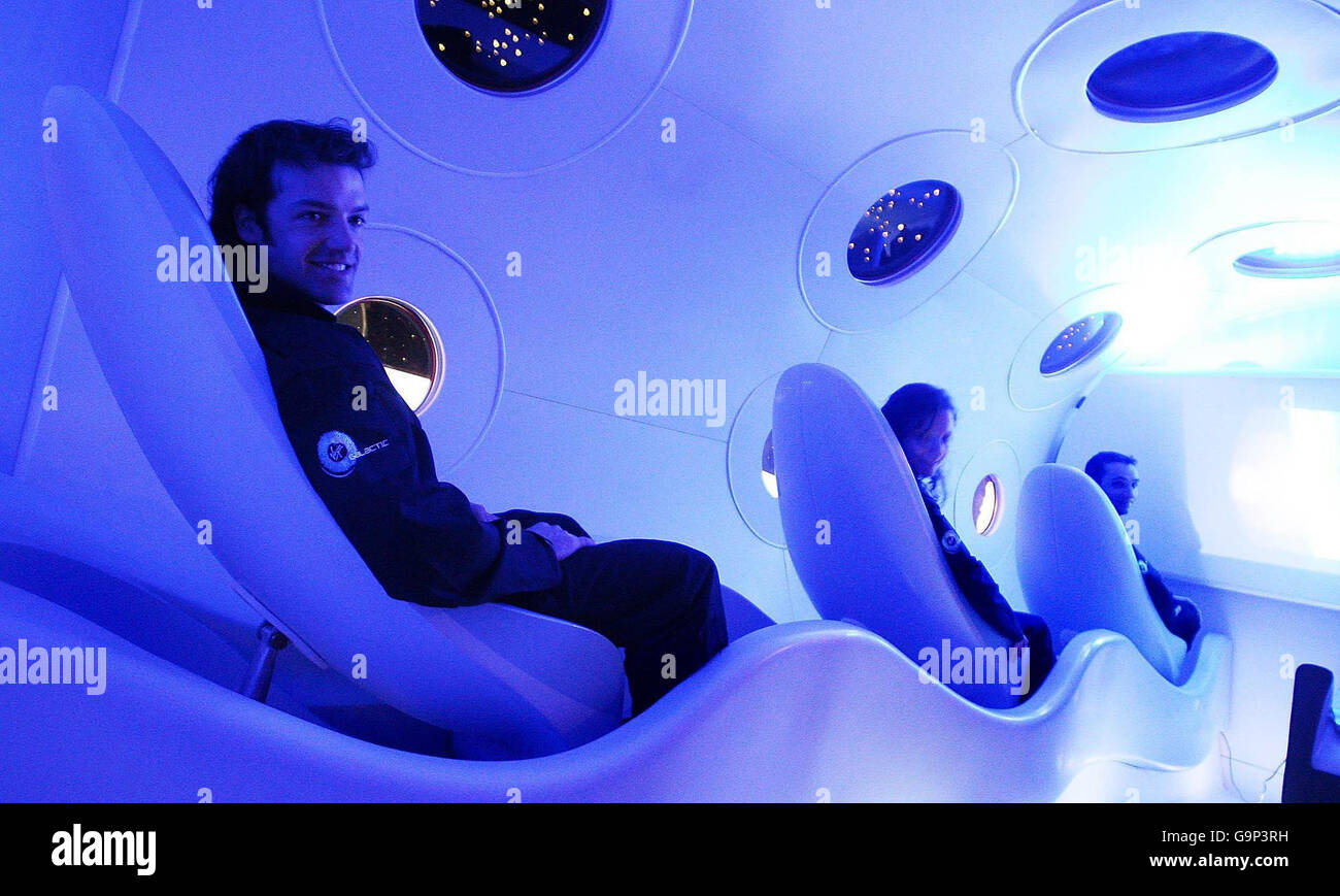 Models sit in the Virgin prototype model of the world's first tourist ...
