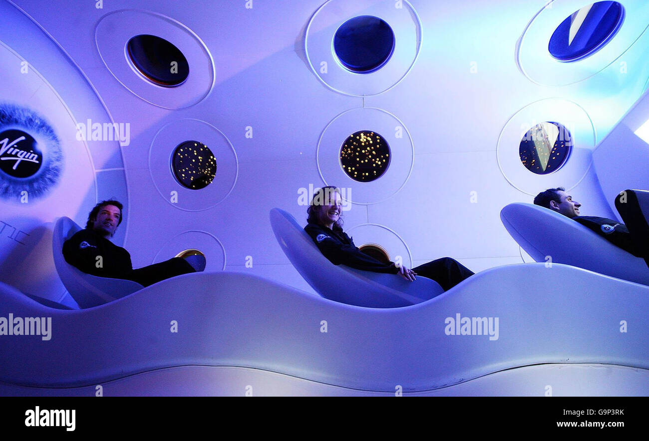 Models sit in the Virgin prototype model of the world's first tourist ...