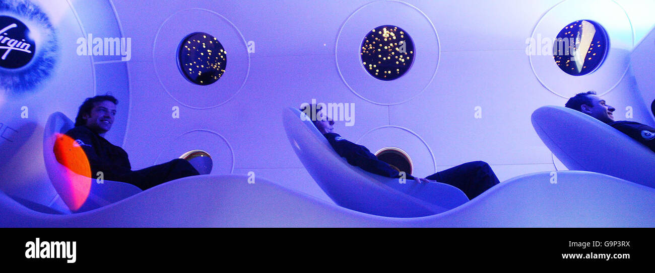 Models sit in the Virgin prototype model of the world's first tourist ...