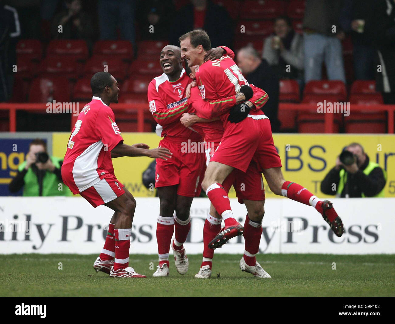 Swindon Town's Andy Nicholas (right) celebrates the opening goal ...