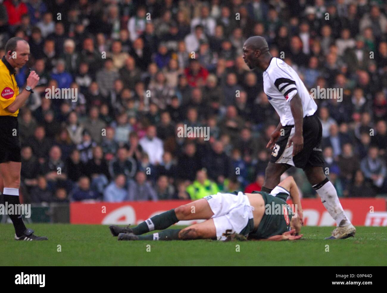 Derby County's Darren Moore reacts after fouling Plymouth Argyle's ...