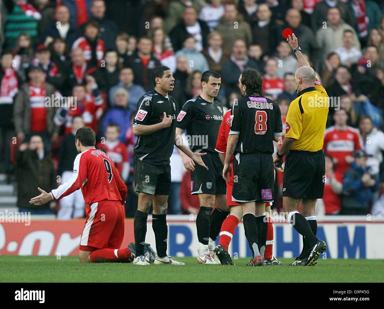 West Bromwich Albion's Curtis Davies (2nd l) is shown a red card by ...