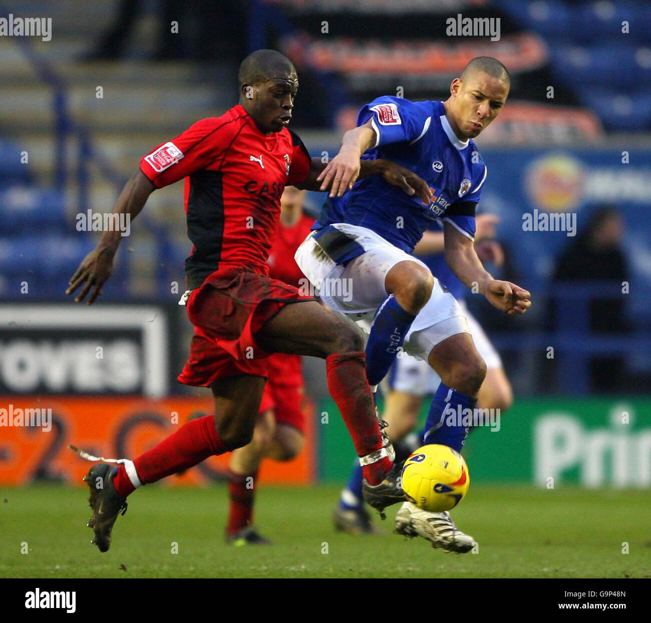 Leicester City's Jason Jarrett (right) and Coventry City's Isaac ...