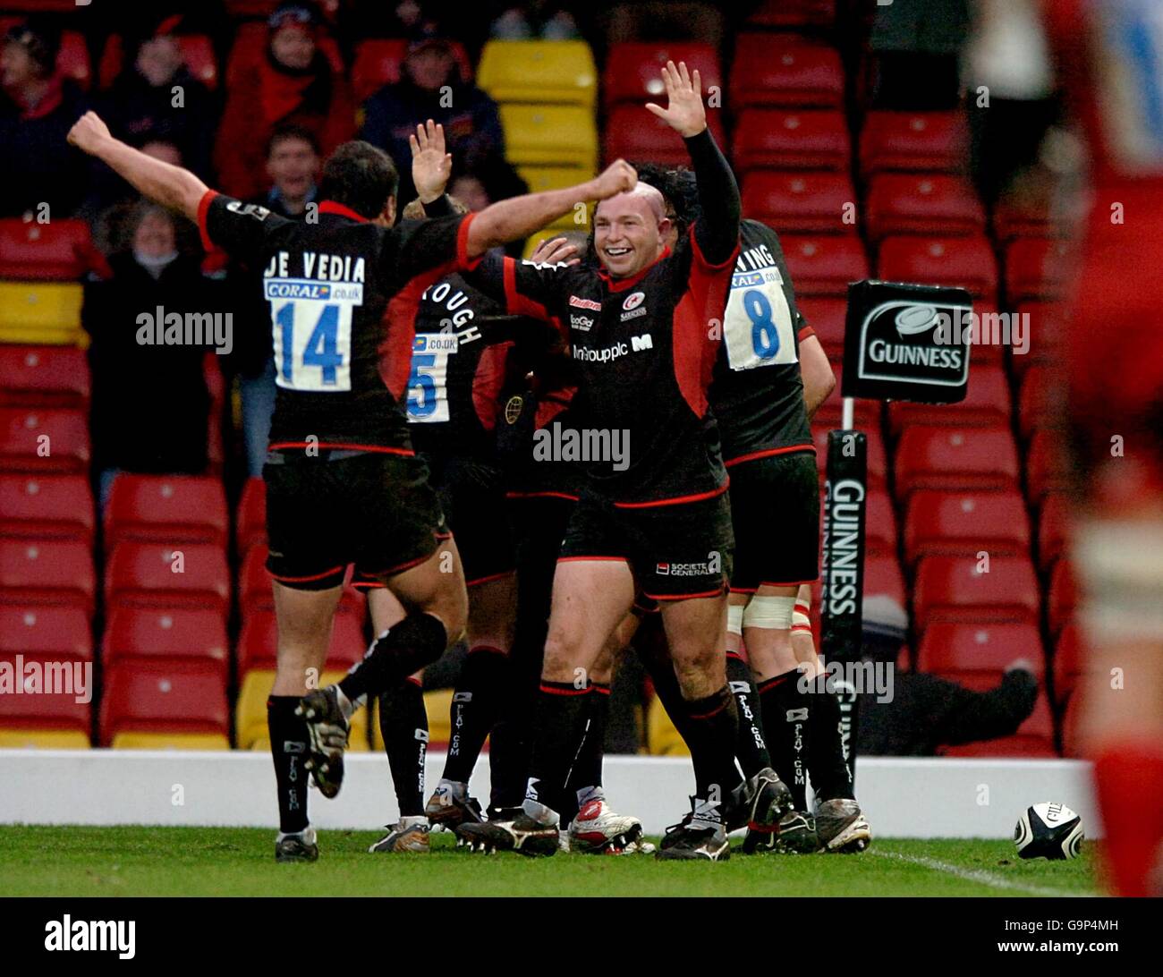 Saracens players celebrate a last minute reversal in fortune following ...