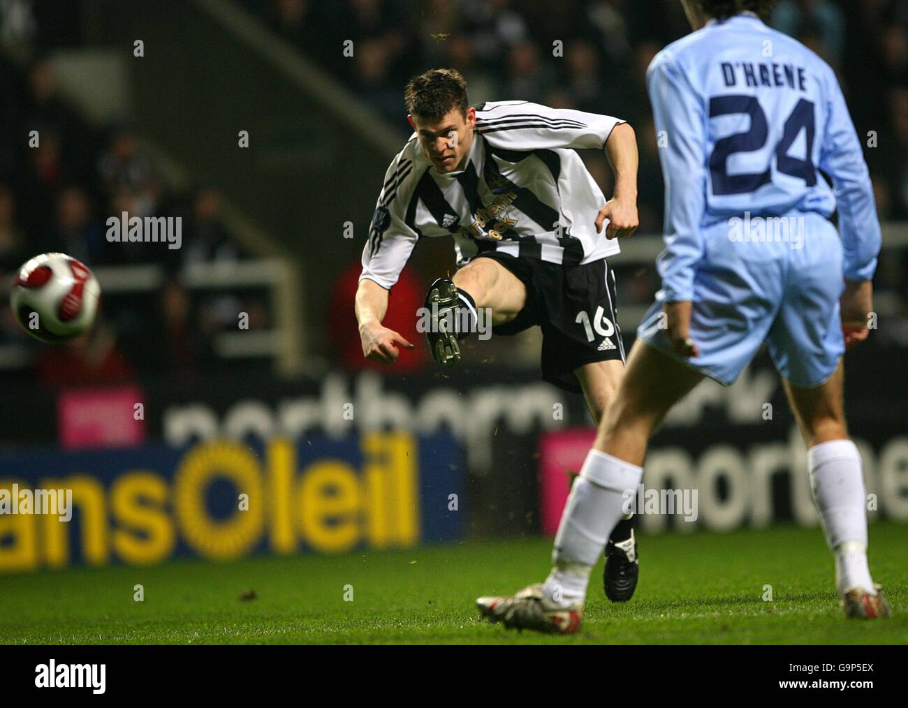 Newcastle uniteds james milner strikes the ball over the bar hi-res ...