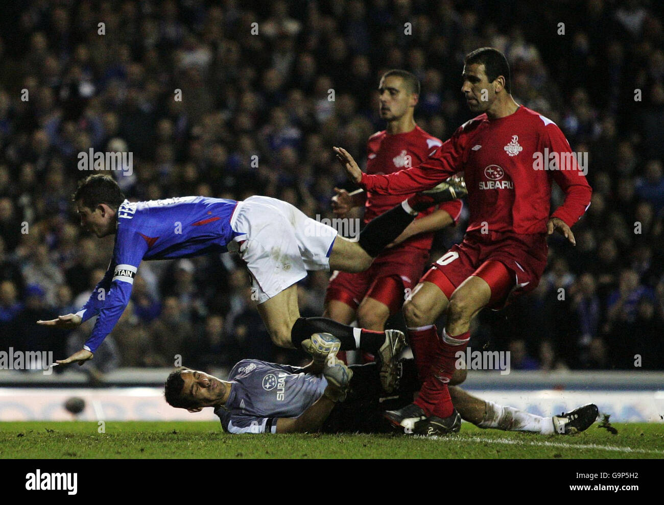 Rangers' Barry Ferguson scores his second goal (left) during the UEFA ...