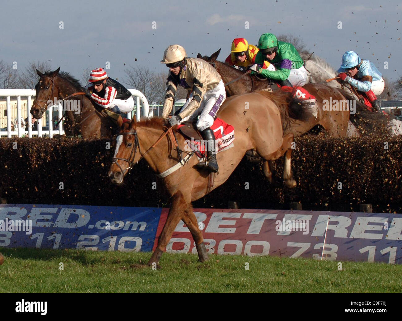 Bewleys Berry and jockey Patrick Brennan (front) leads from Kelami and ...